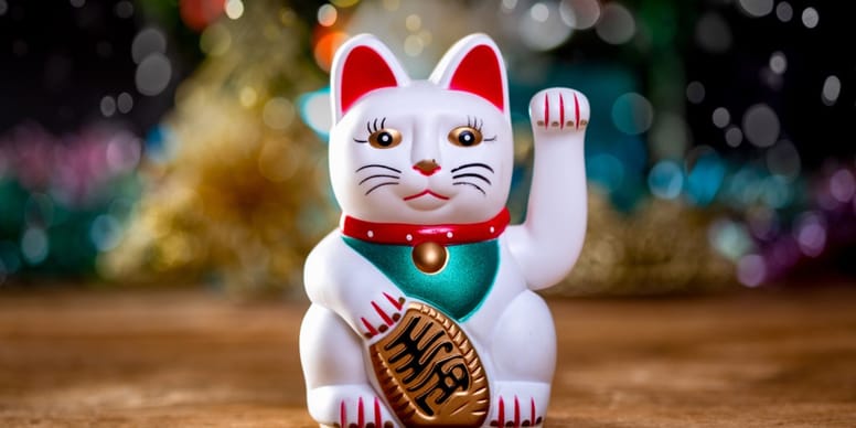 Maneki-Neko : L'histoire fascinante du chat porte-bonheur japonais